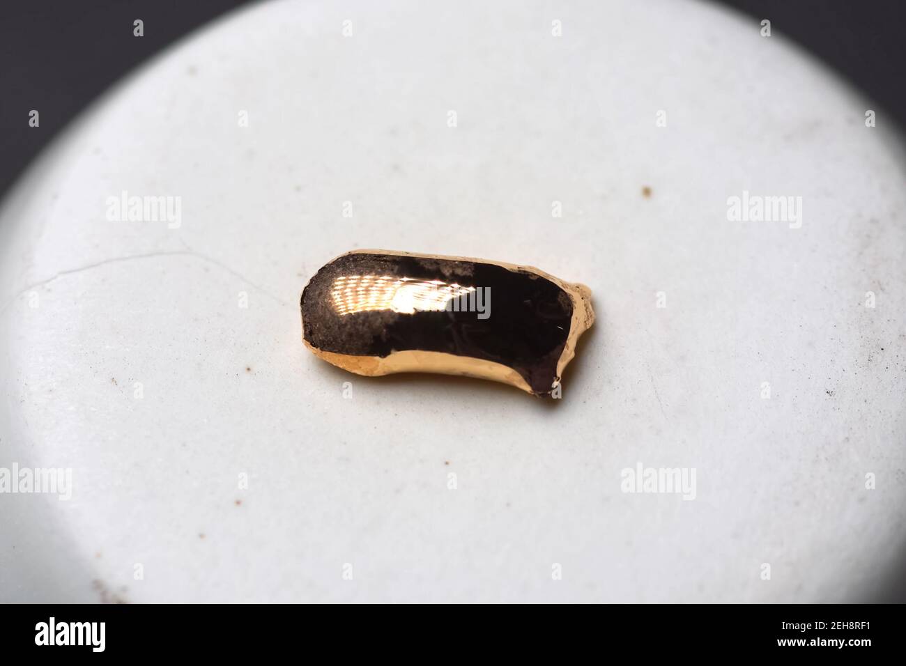 Melted gold hi-res stock photography and images - Alamy