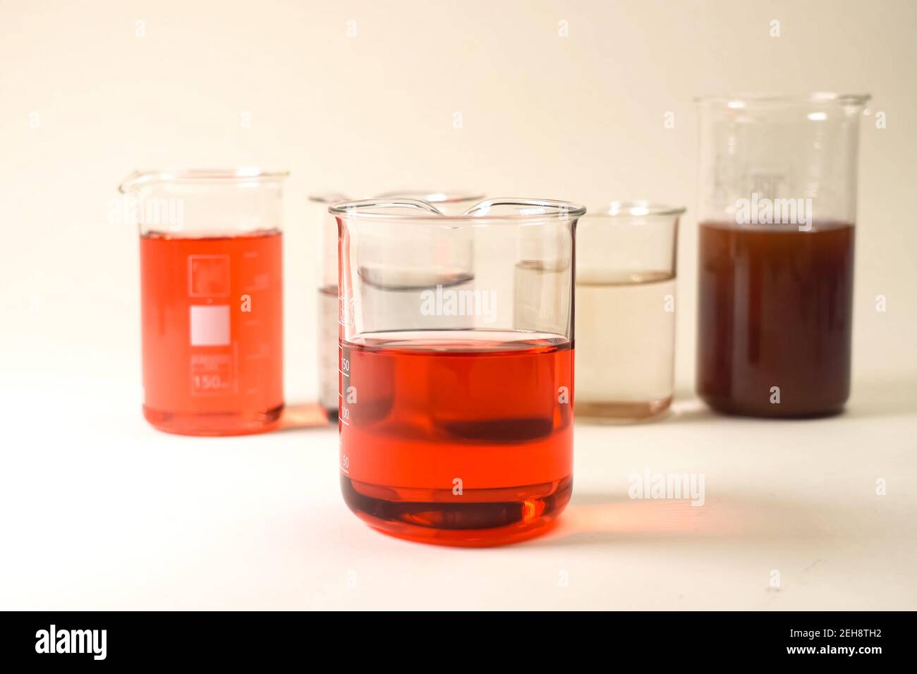 Orange liquid in glass beaker hi-res stock photography and images - Alamy