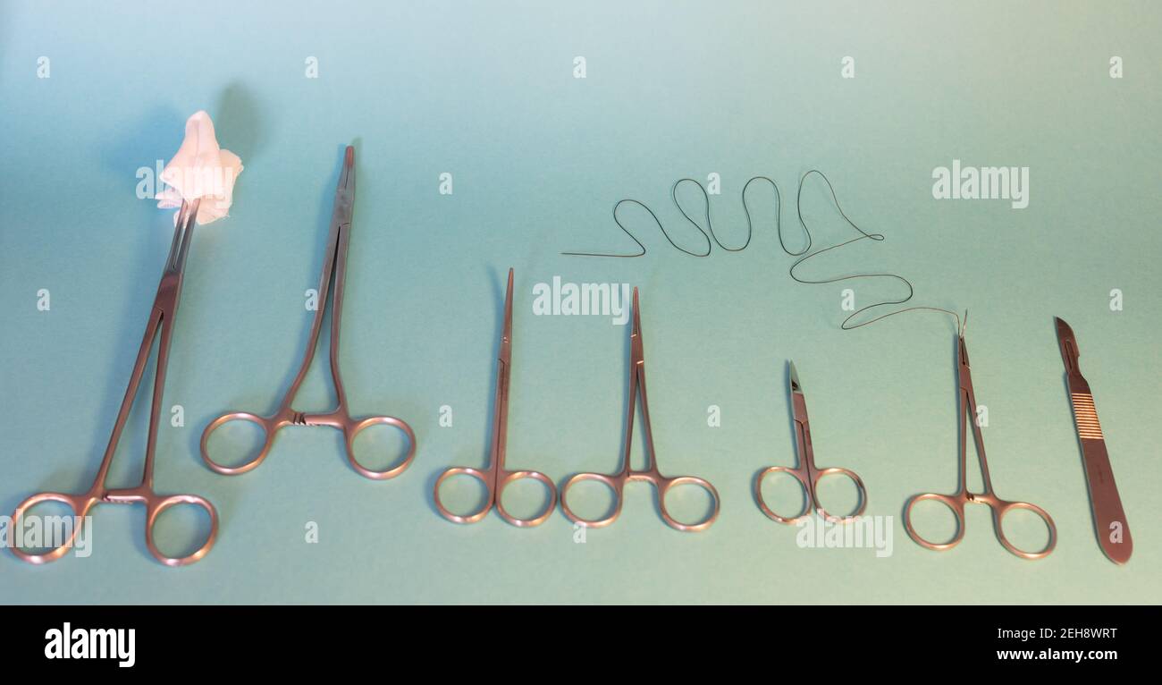 instruments for surgery in green surgical field Stock Photo - Alamy