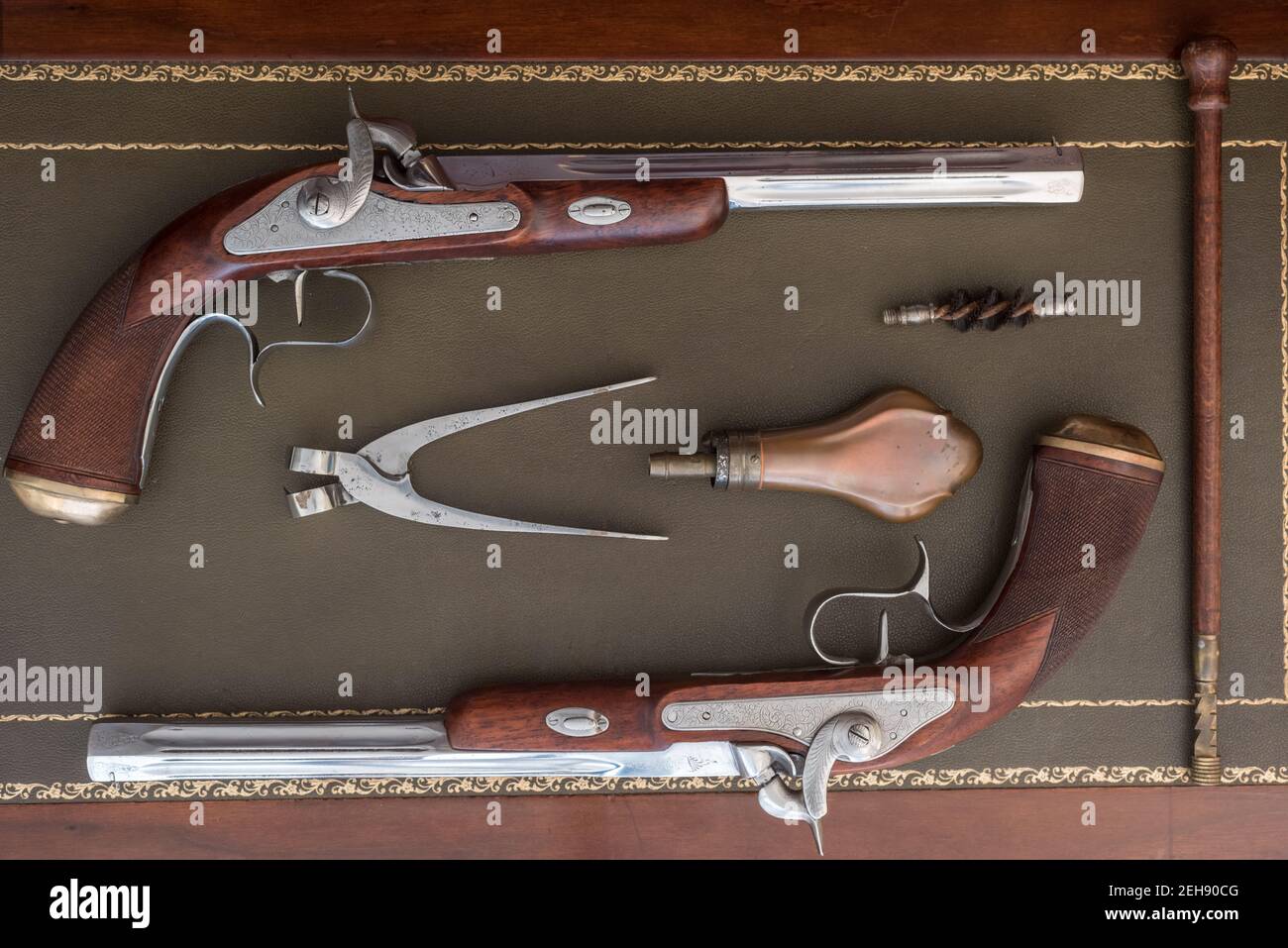 old pistol with equipment magazine powder Stock Photo - Alamy