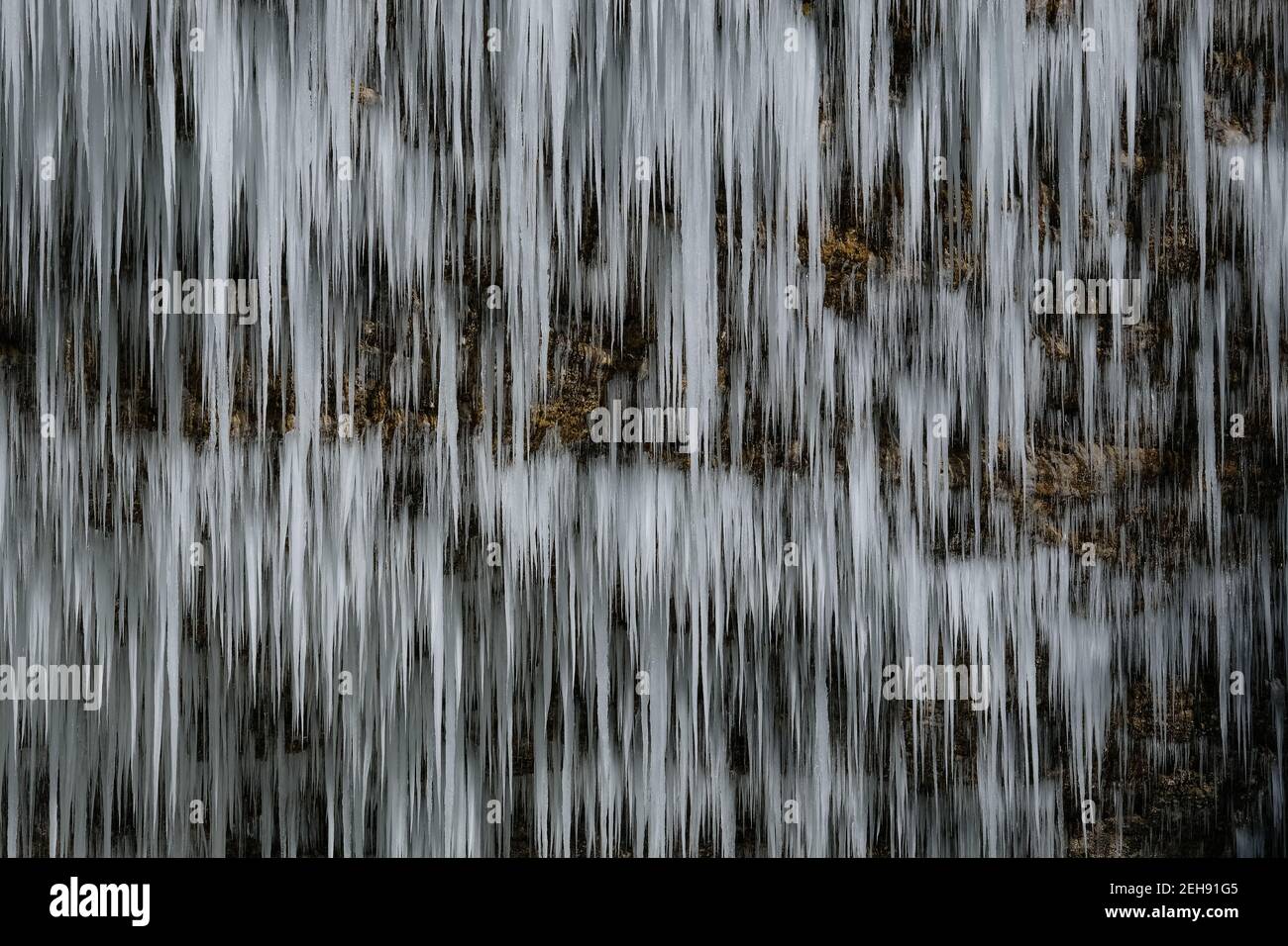 Waterfall crashing down frozen cave hi-res stock photography and images ...