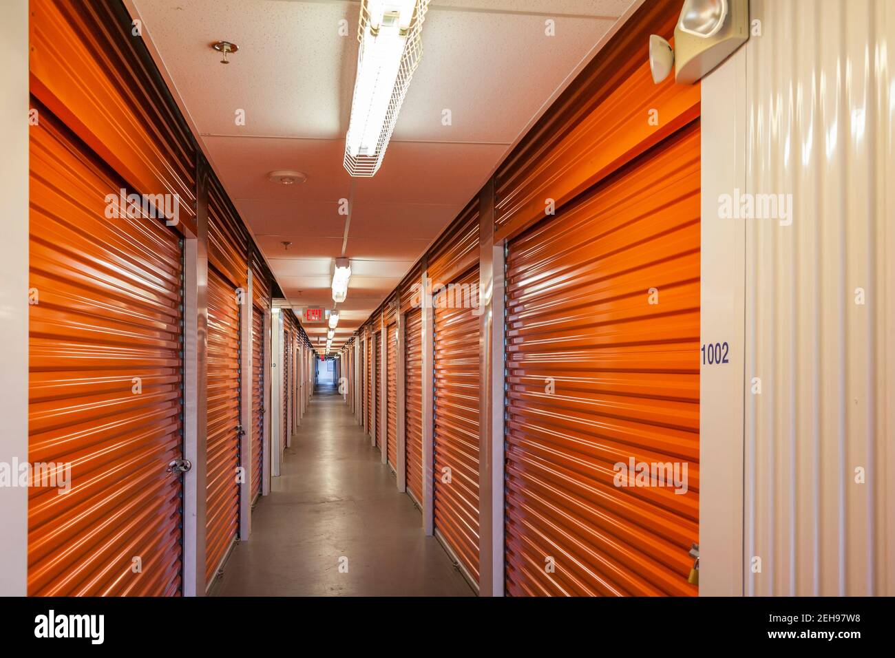 Orange interior of self storage units at an enclosed mini warehouse ...