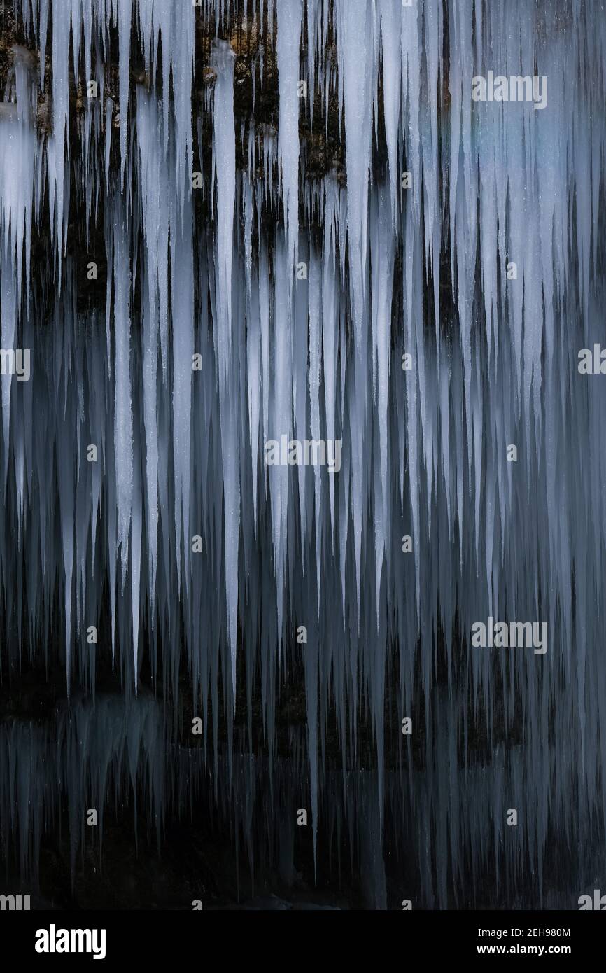 Waterfall crashing down frozen cave hi-res stock photography and images ...