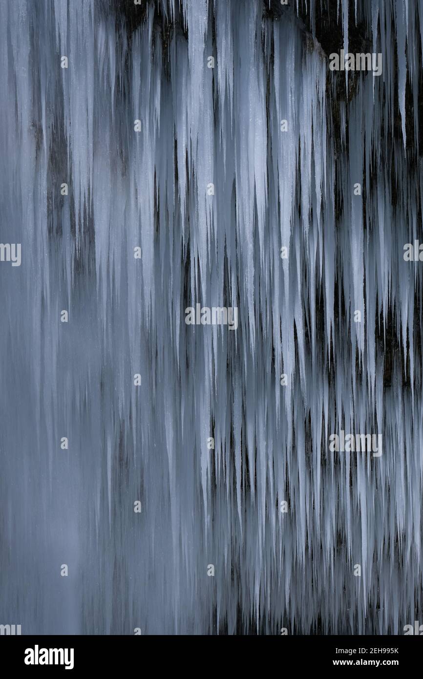 Waterfall crashing down frozen cave hi-res stock photography and images ...