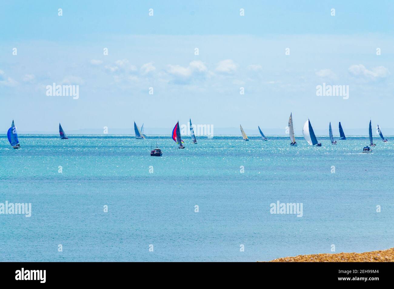 Sailing yachts racing at Sandwich Bay-a long sweeping inlet of sea ...