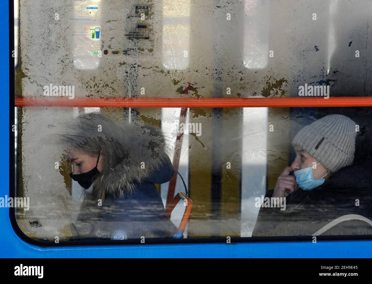 People wearing face masks as a precaution against the spread of ...