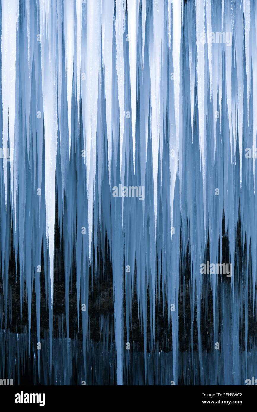 Waterfall crashing down frozen cave hi-res stock photography and images ...