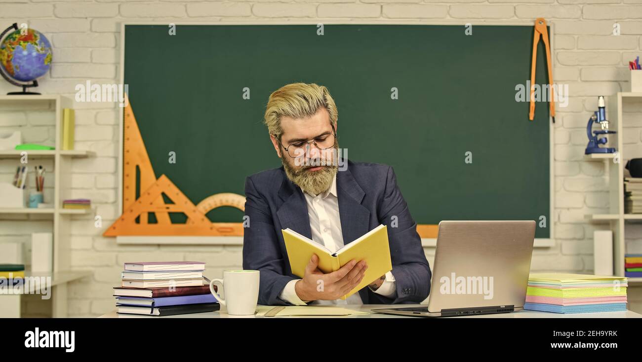 Digital technology. School teacher with laptop. Web development ...