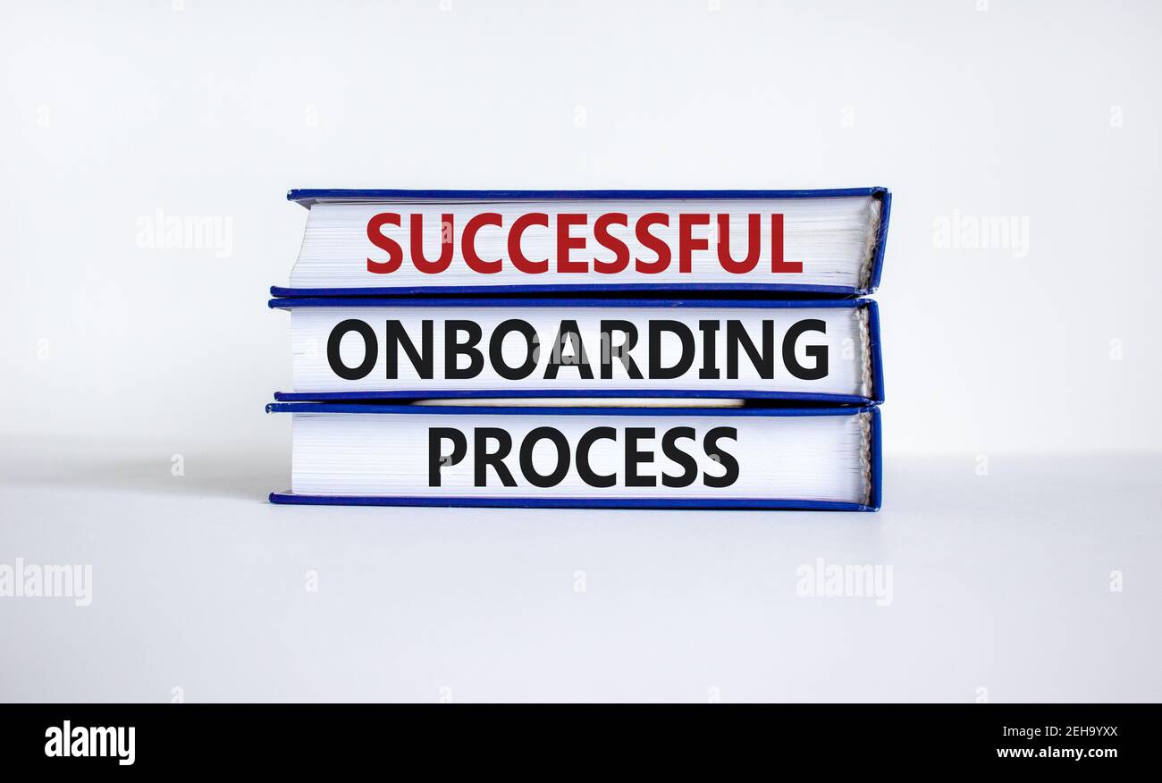 Successful onboarding process symbol. Books with words 'Successful ...