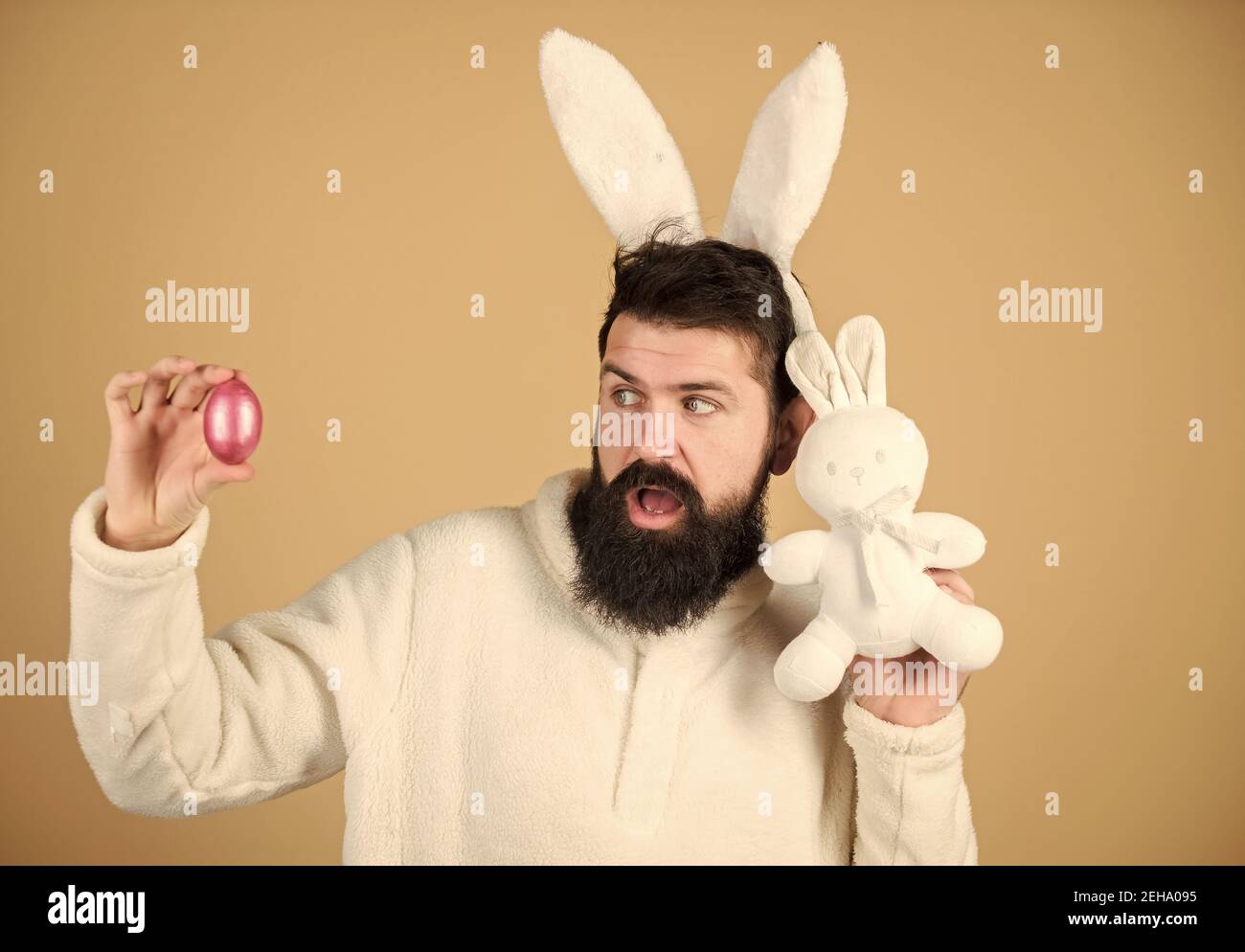 Easter rabbit. Man wearing rabbit suit. Funny bunny man soft ears ...