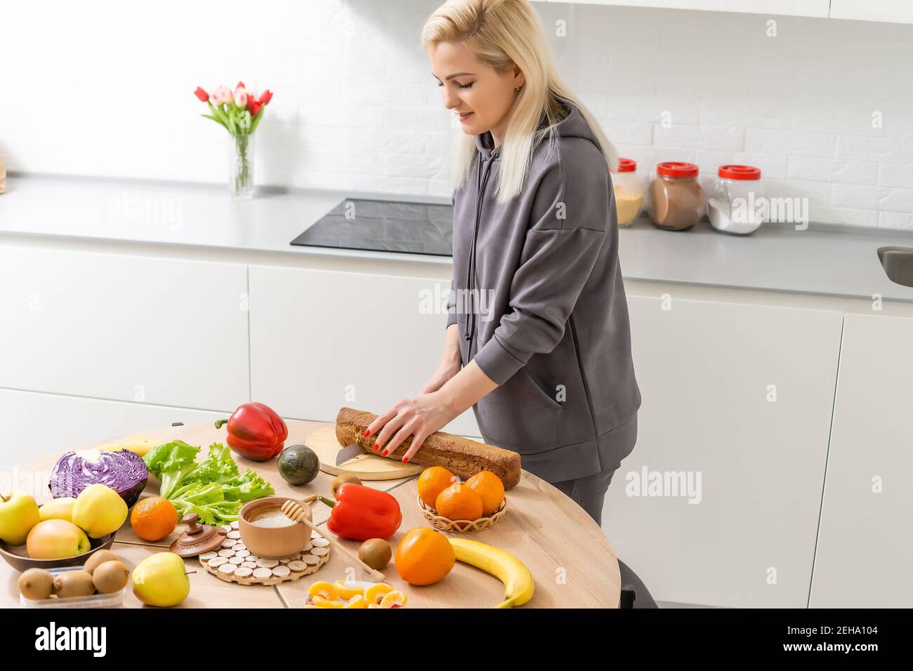 Healthy food. Woman preparing fruits and vegetables Stock Photo - Alamy