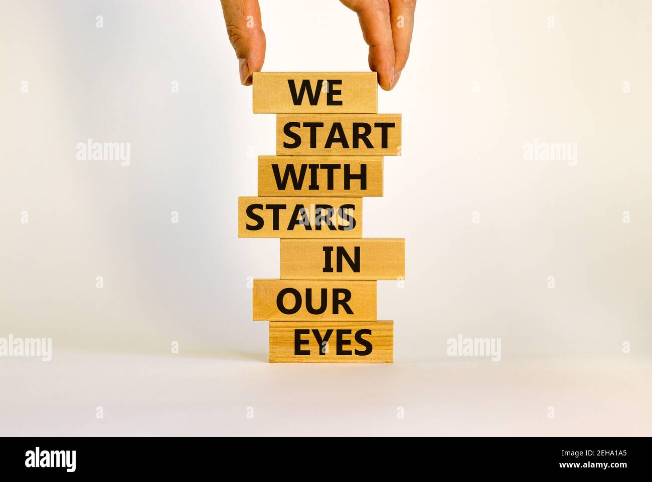 Symbol of building success foundation. Businessman put wooden blocks on ...