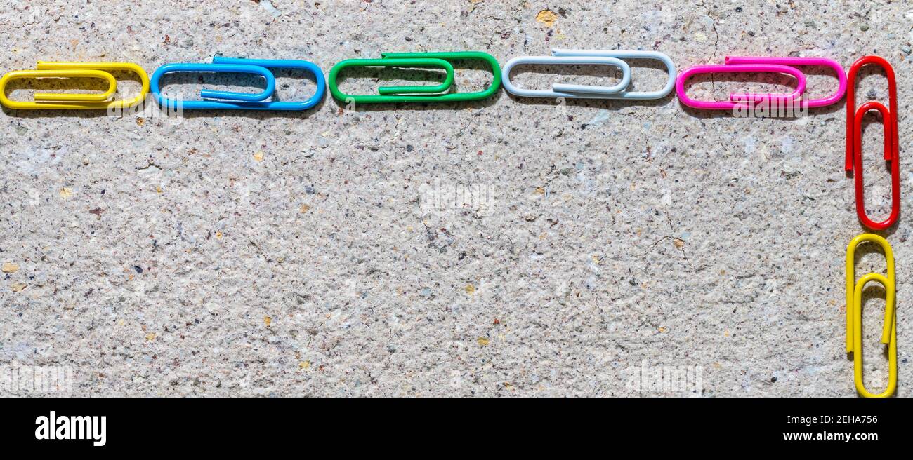 Frame made of colorful paper clips on a stone background Stock Photo ...