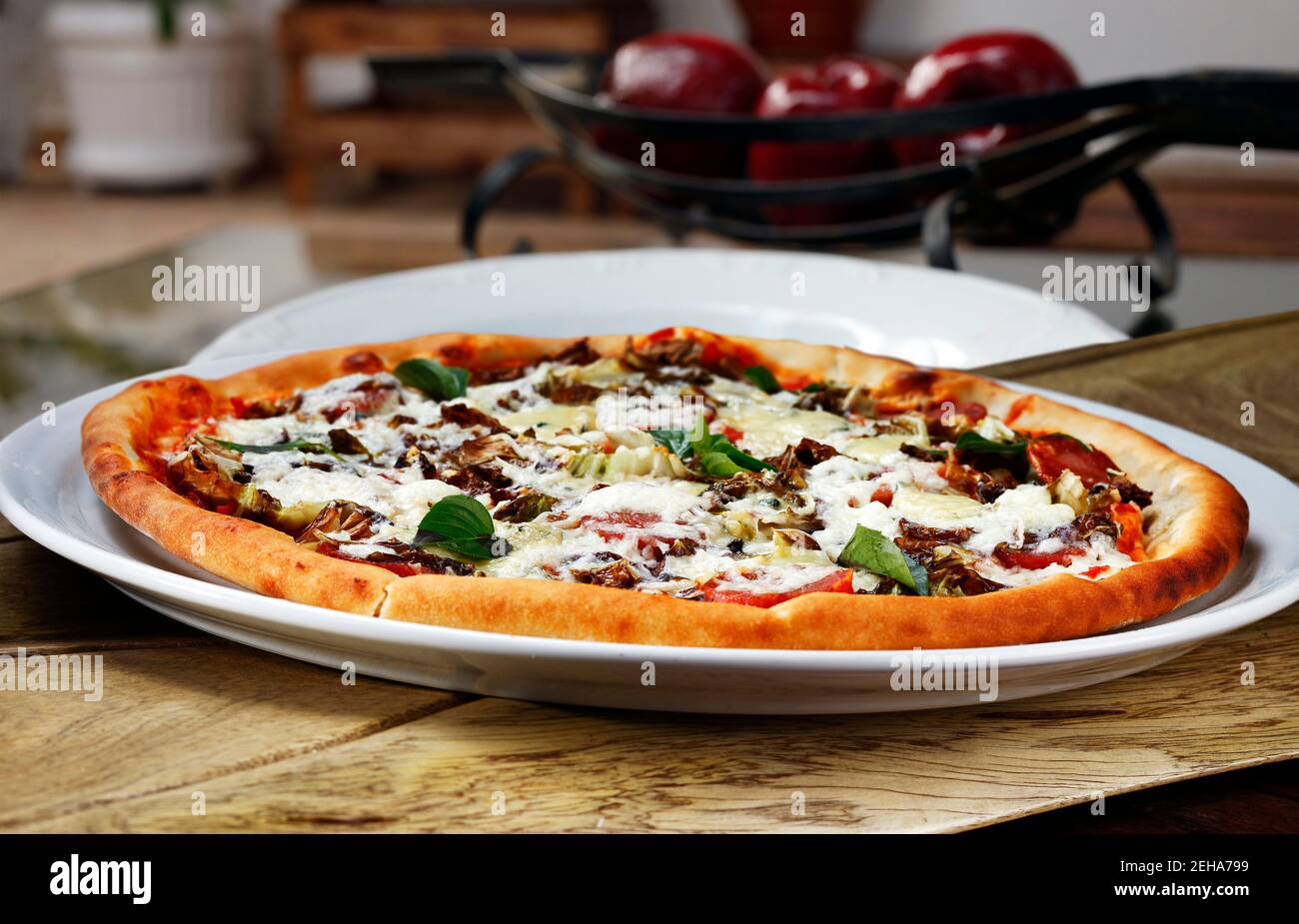 Delicious roast pizza, tomato, mozzarella Stock Photo - Alamy
