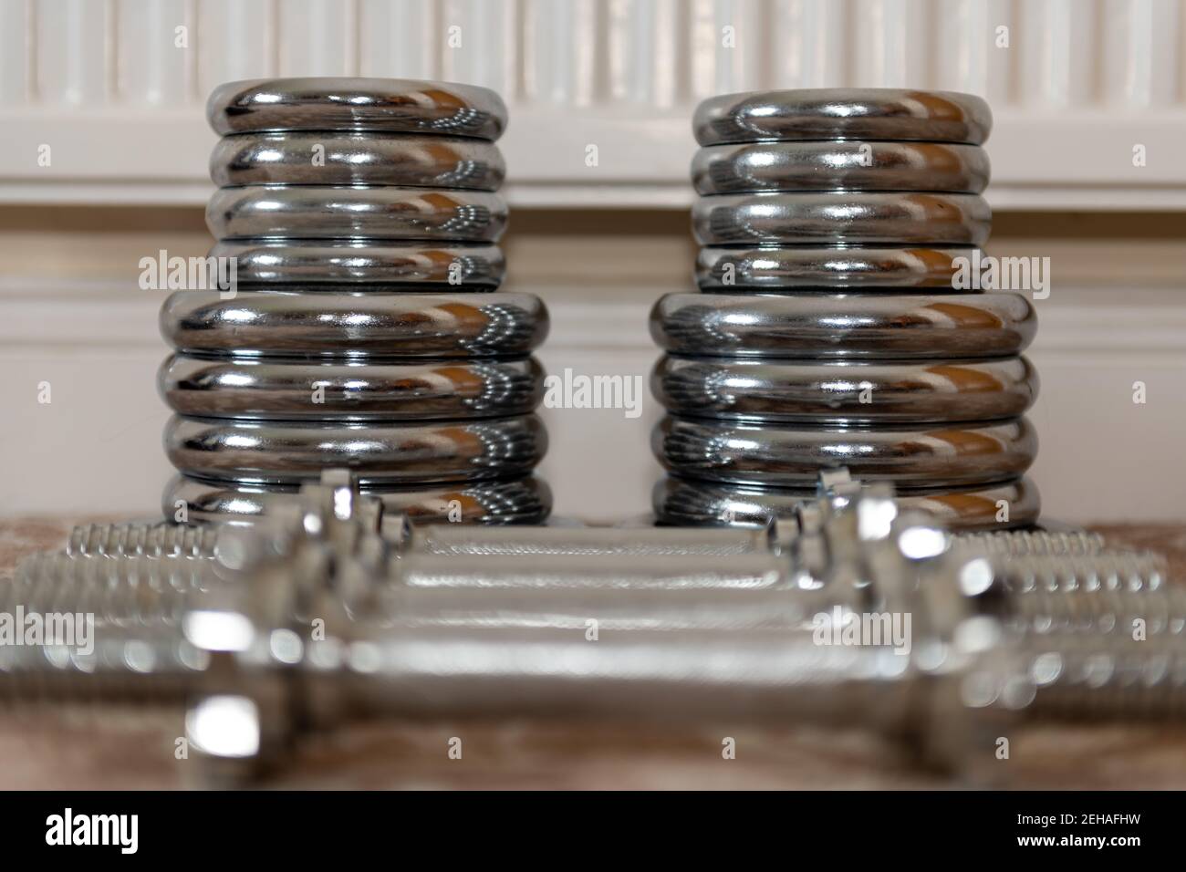 Close up of weight lifting equipment on the floor at home Stock Photo ...