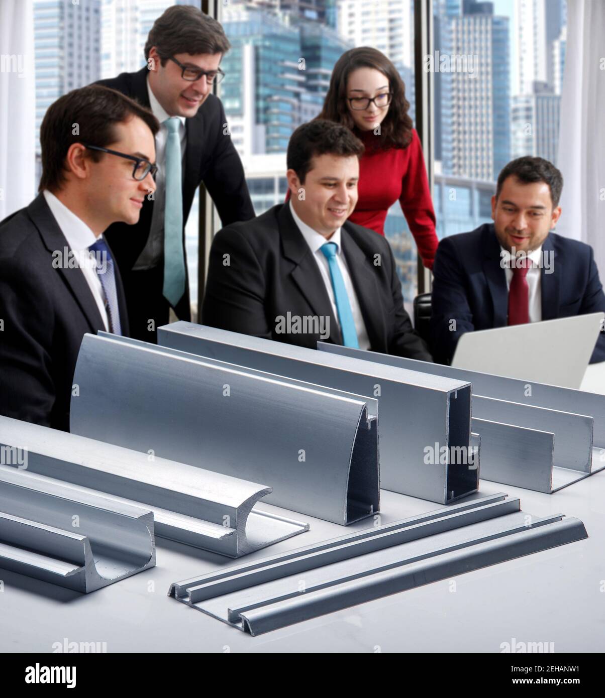 Architects and executives in meeting, building construction using ...