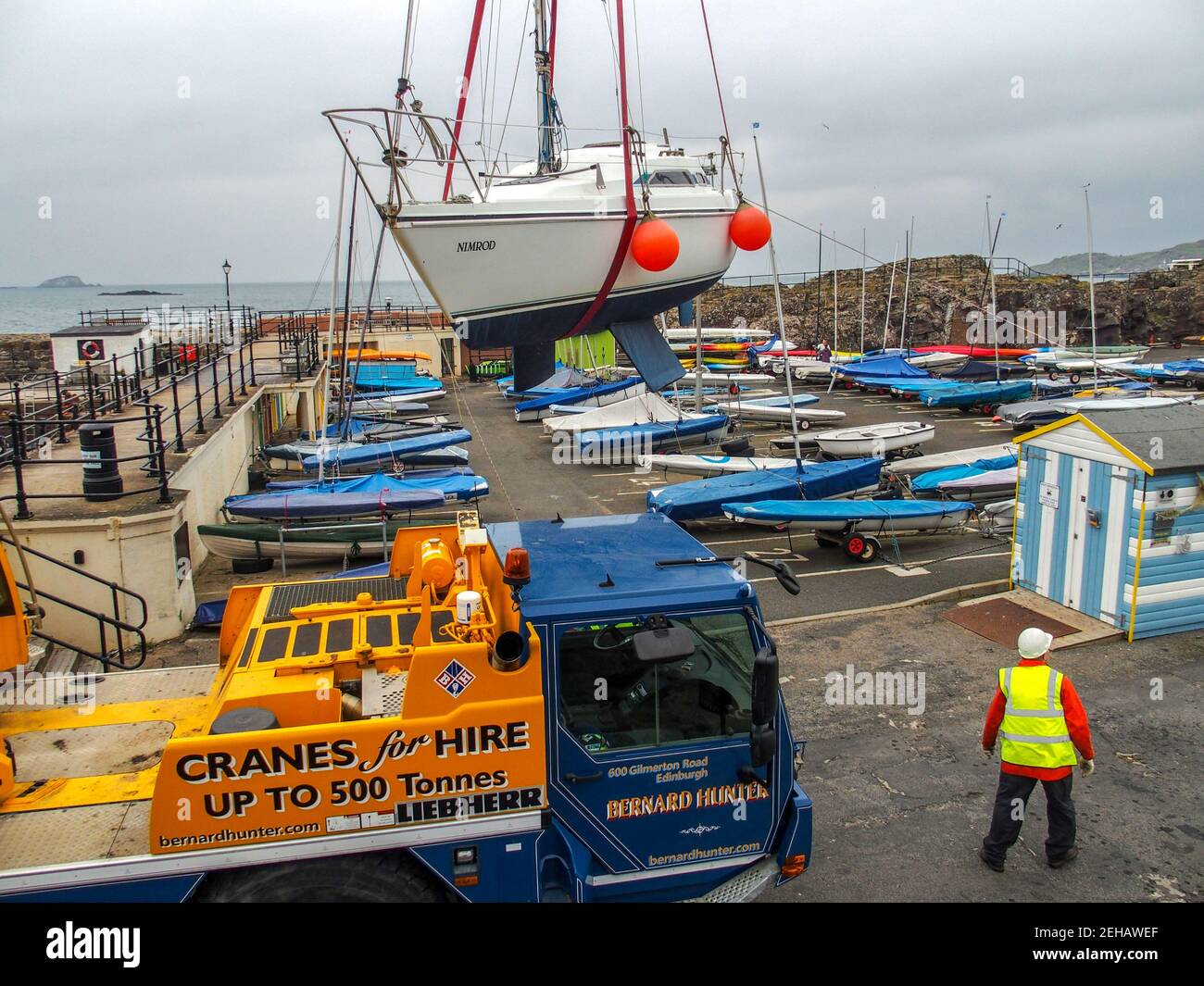 Hunter Horizon 27 yacht being craned into harbour at North Berwick ...