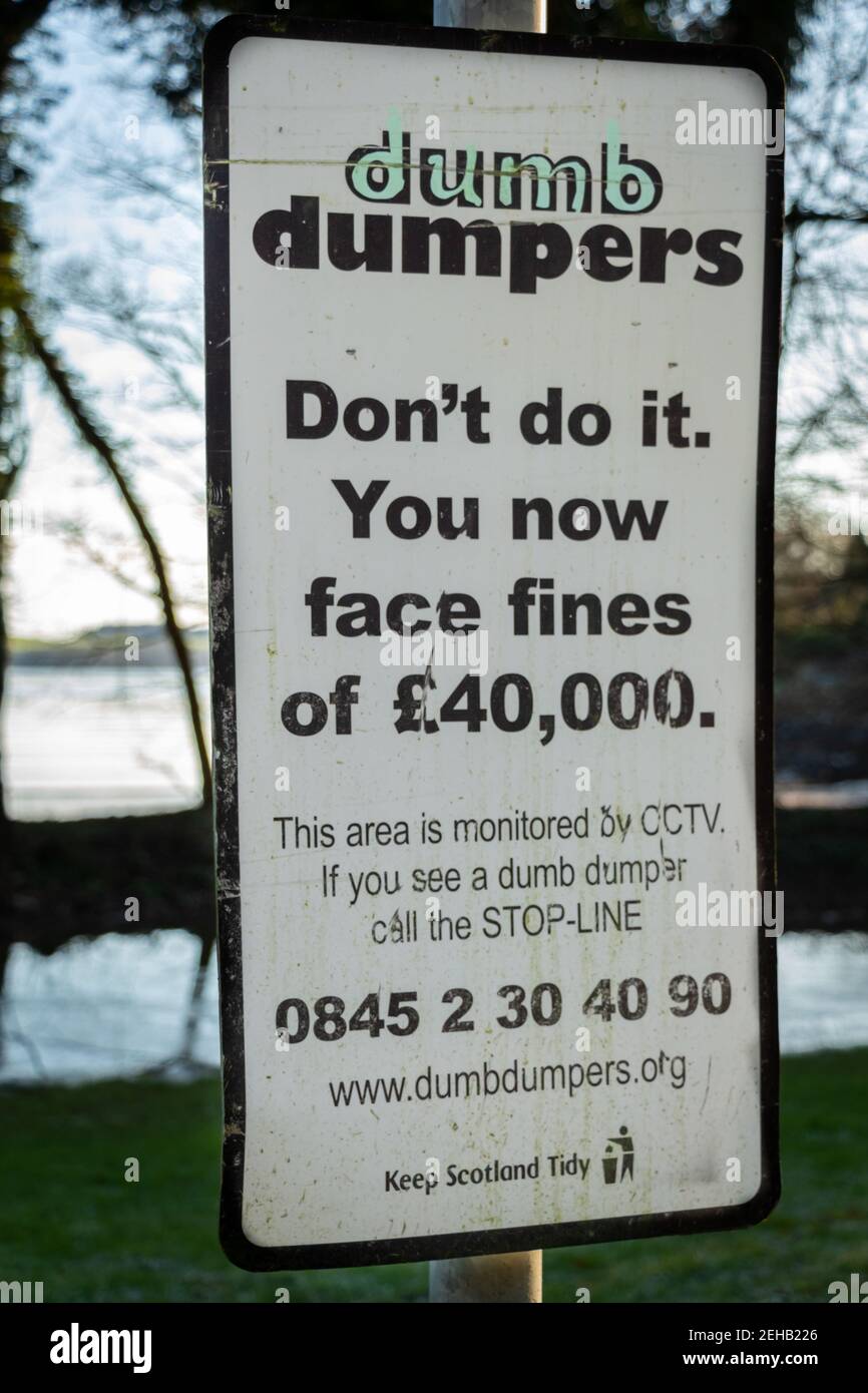 Dumb dumpers sign hi-res stock photography and images - Alamy