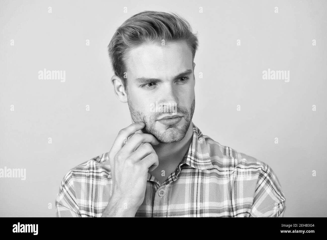 Male face care aftershave balsam hi-res stock photography and images ...