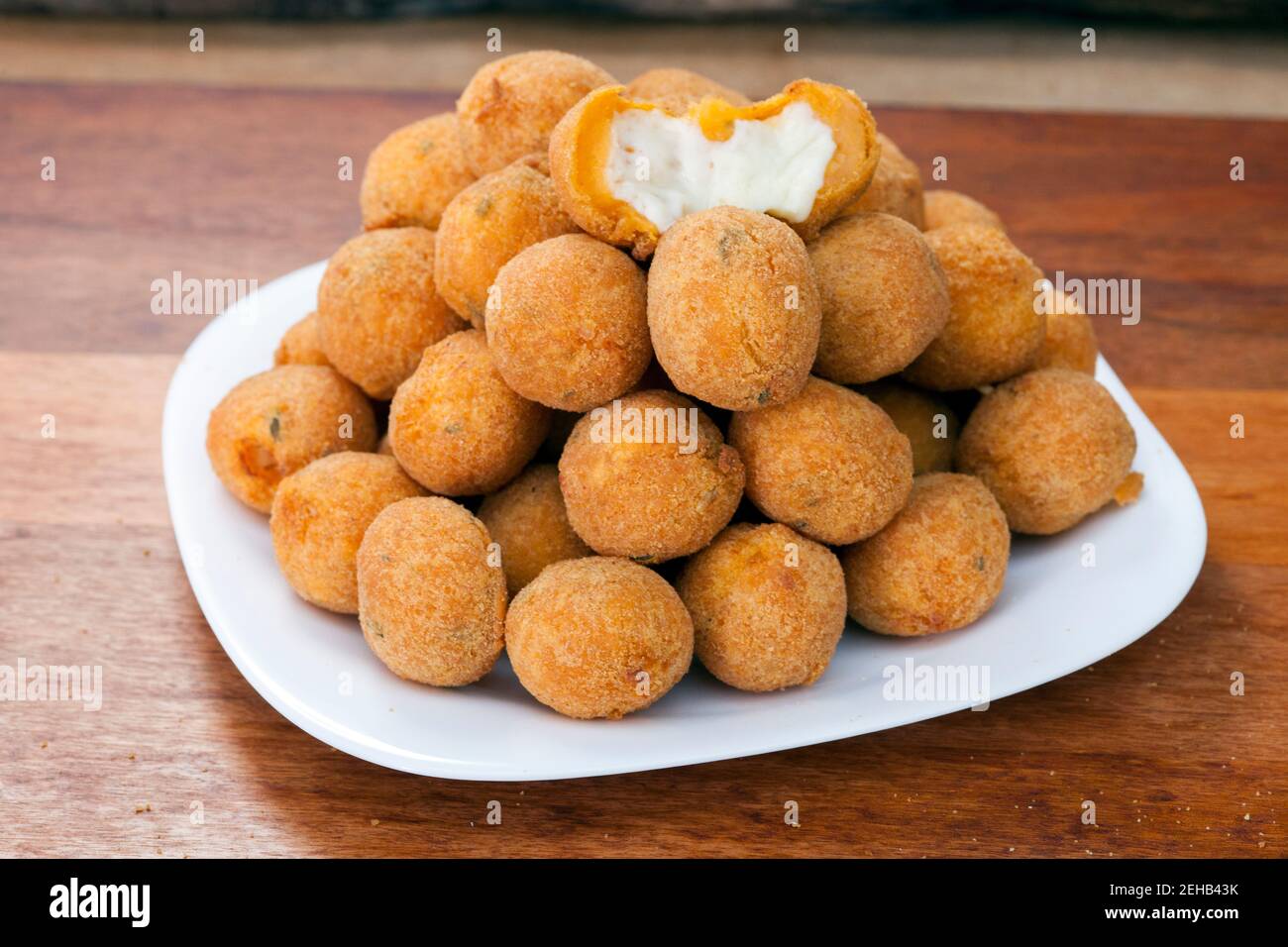 Brazilian snack, Chicken snack with curd filling Stock Photo - Alamy