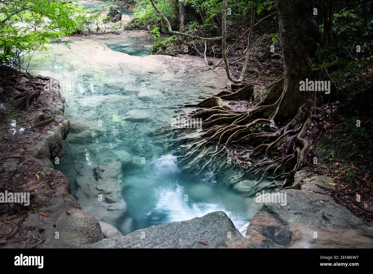 Waterfall and turquoise natural pool in erawan national park hi-res ...