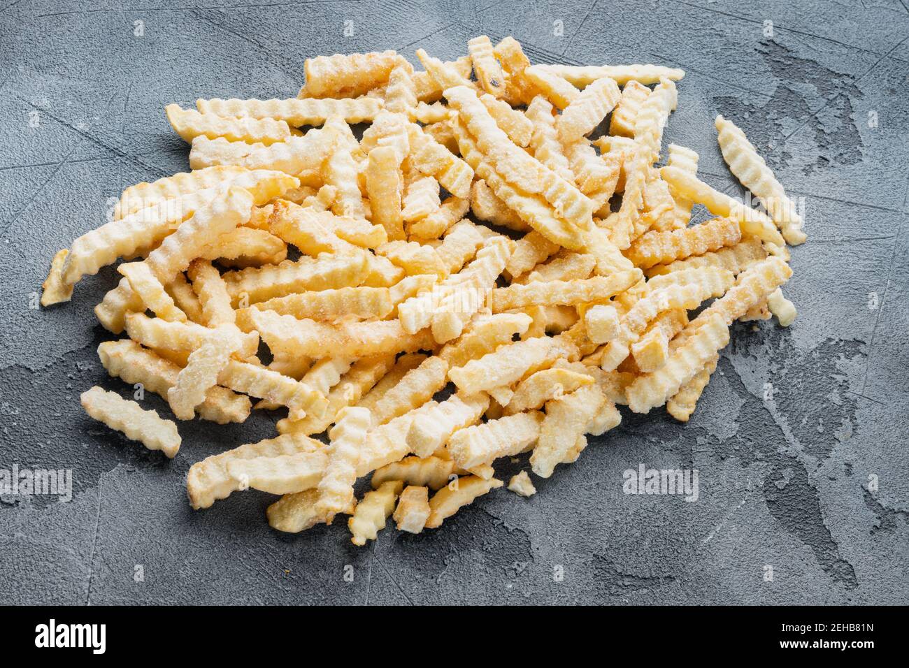 Frozen French fries potatoes set, on gray background Stock Photo - Alamy