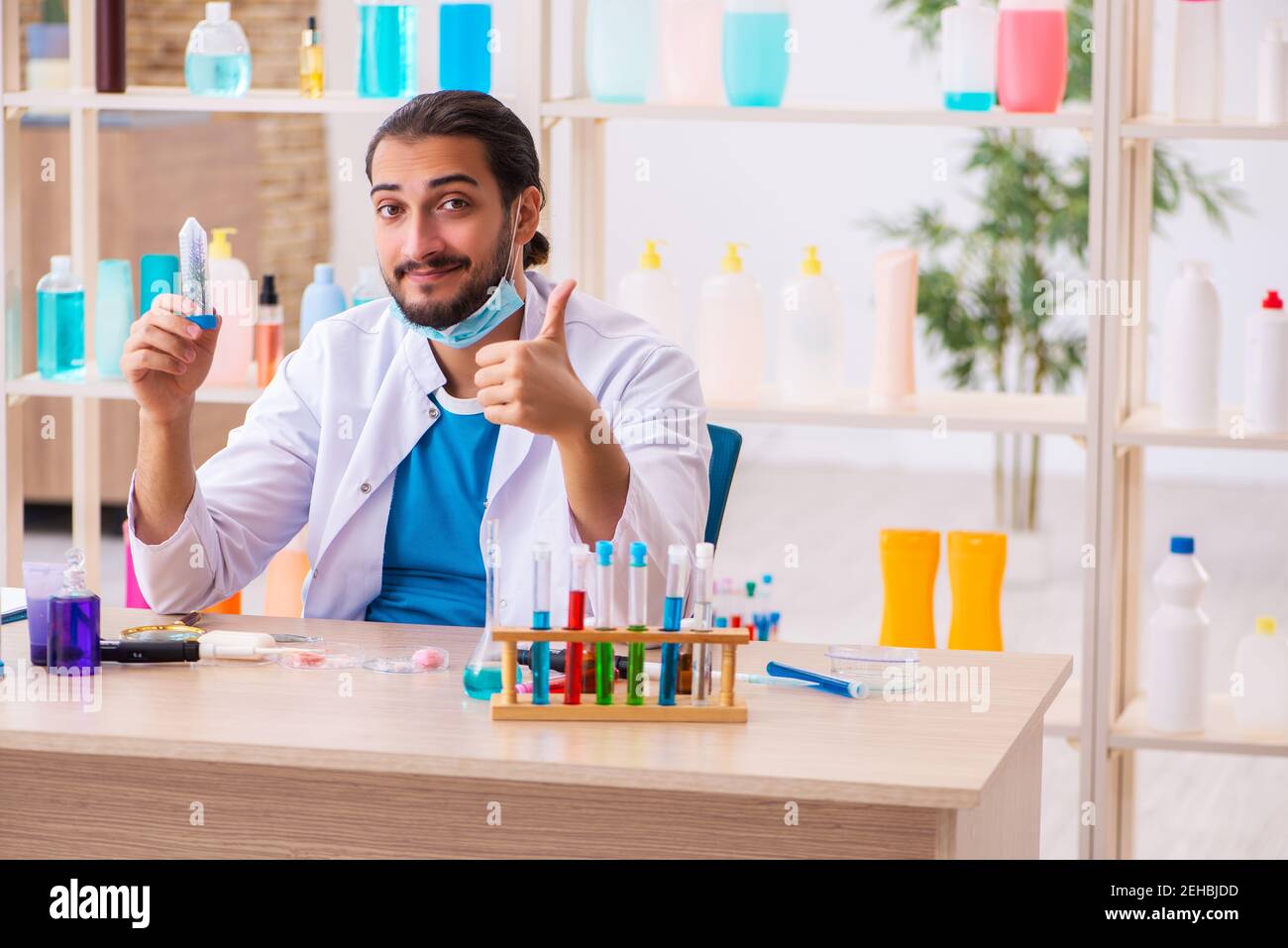 Young chemist testing soap in the lab Stock Photo - Alamy