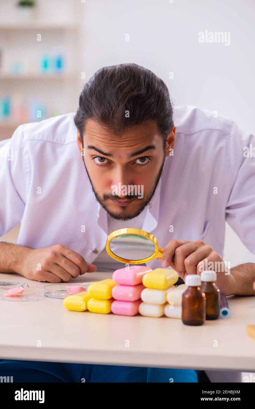 Young chemist testing soap in the lab Stock Photo - Alamy