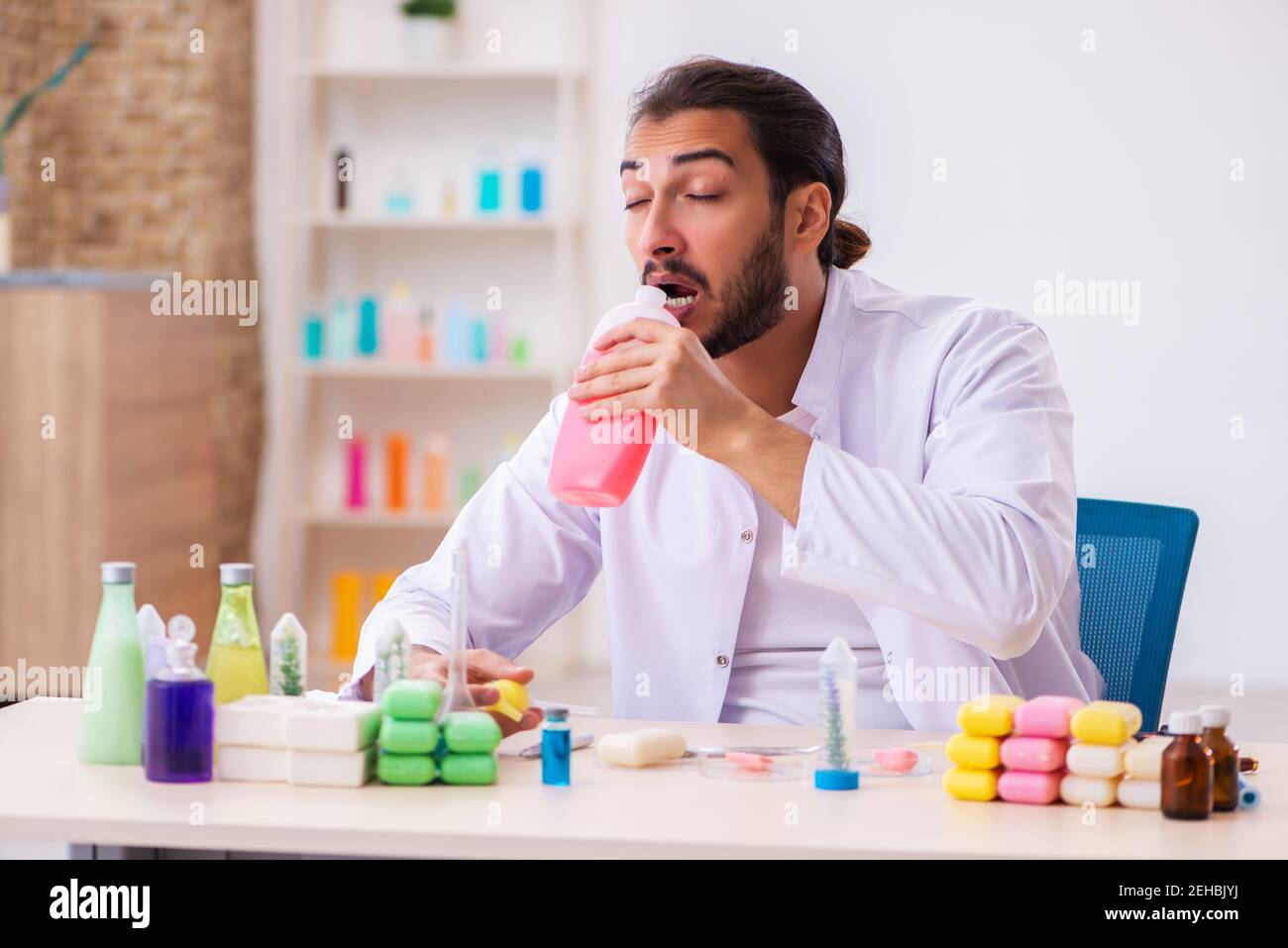 Young chemist testing soap in the lab Stock Photo - Alamy