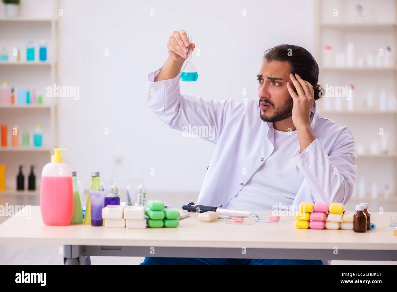 Young chemist testing soap in the lab Stock Photo - Alamy