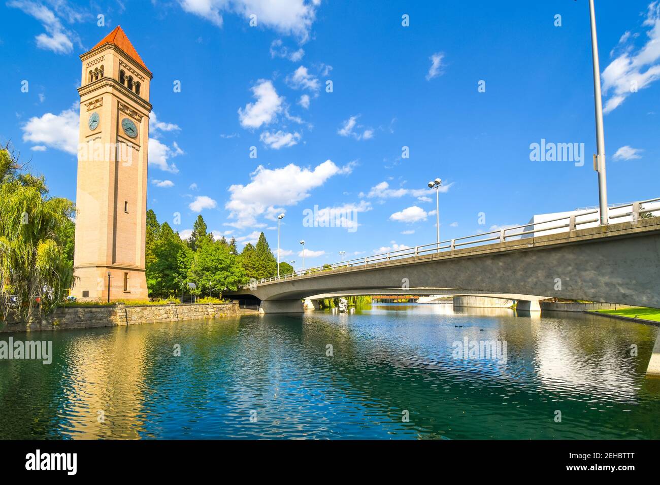 The River Bridge over the Spokane River leading to the clock tower in ...