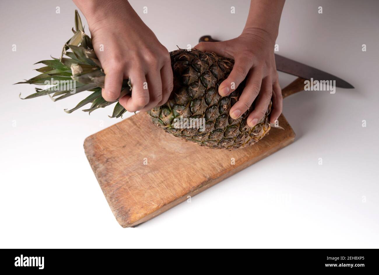 preparing a good pineapple on the table Stock Photo - Alamy