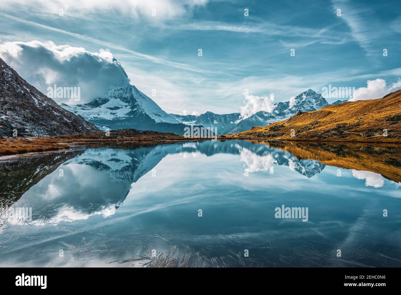 Blue water reflection of matterhorn in riffelsee hi-res stock ...