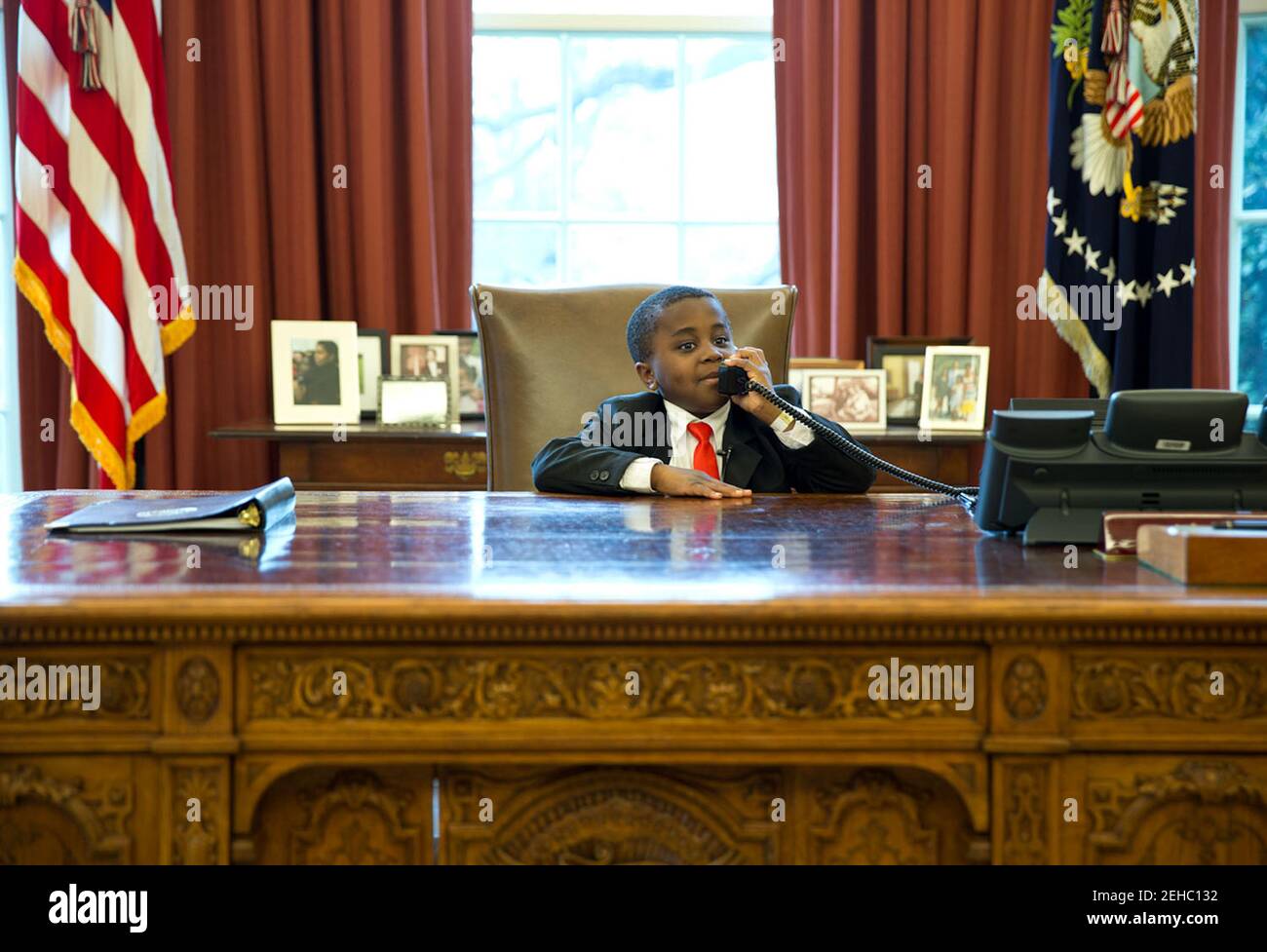 April 1, 2013 "Robby Novak, AKA 'Kid President', feigns a phone call at ...