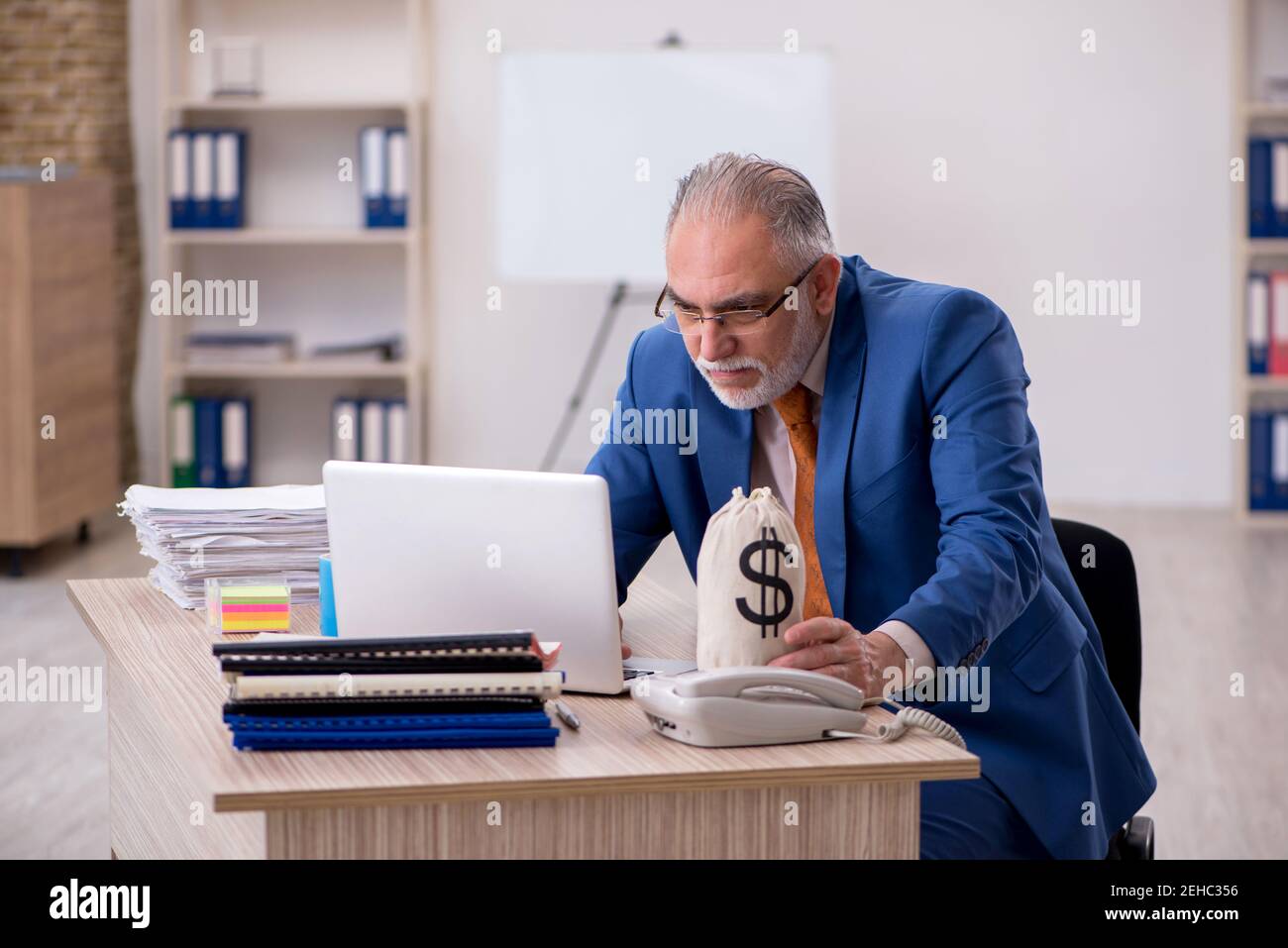 Aged businessman employee in retirement concept Stock Photo - Alamy