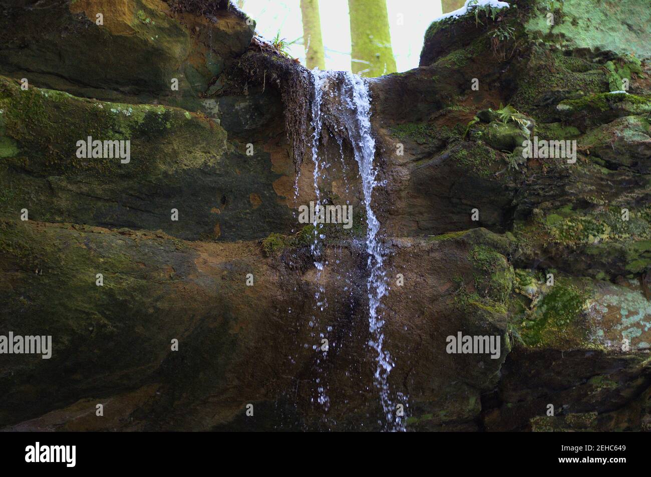 Closeup shot of water flowing from a clif Stock Photo - Alamy