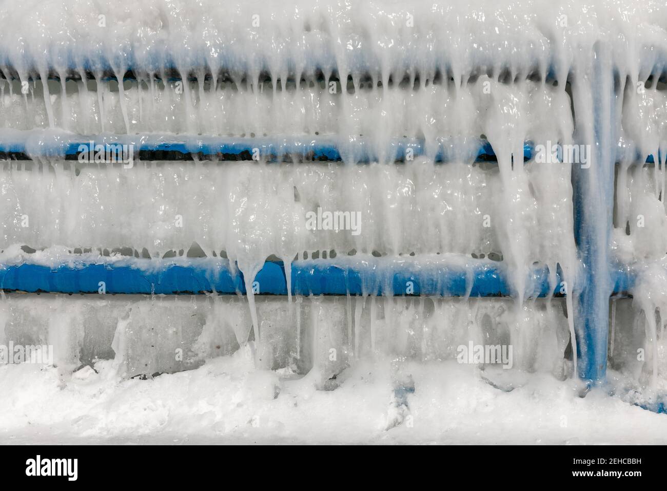 Icy blue handrail in winter Stock Photo - Alamy
