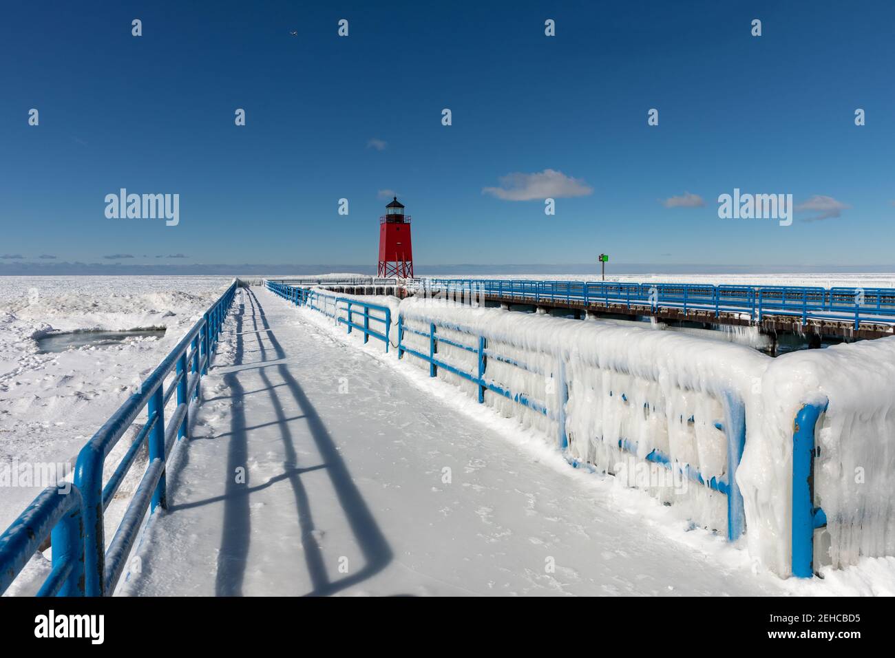 Frozen walkway to the Charlevoix lighthouse Stock Photo - Alamy