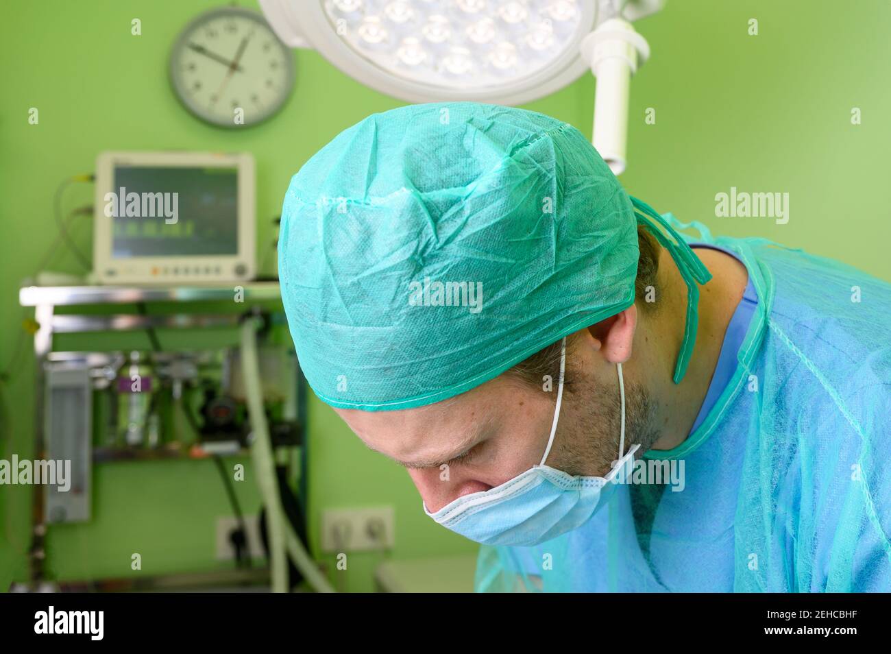 Portrait of male surgeon in a operating room at hospital. High quality ...