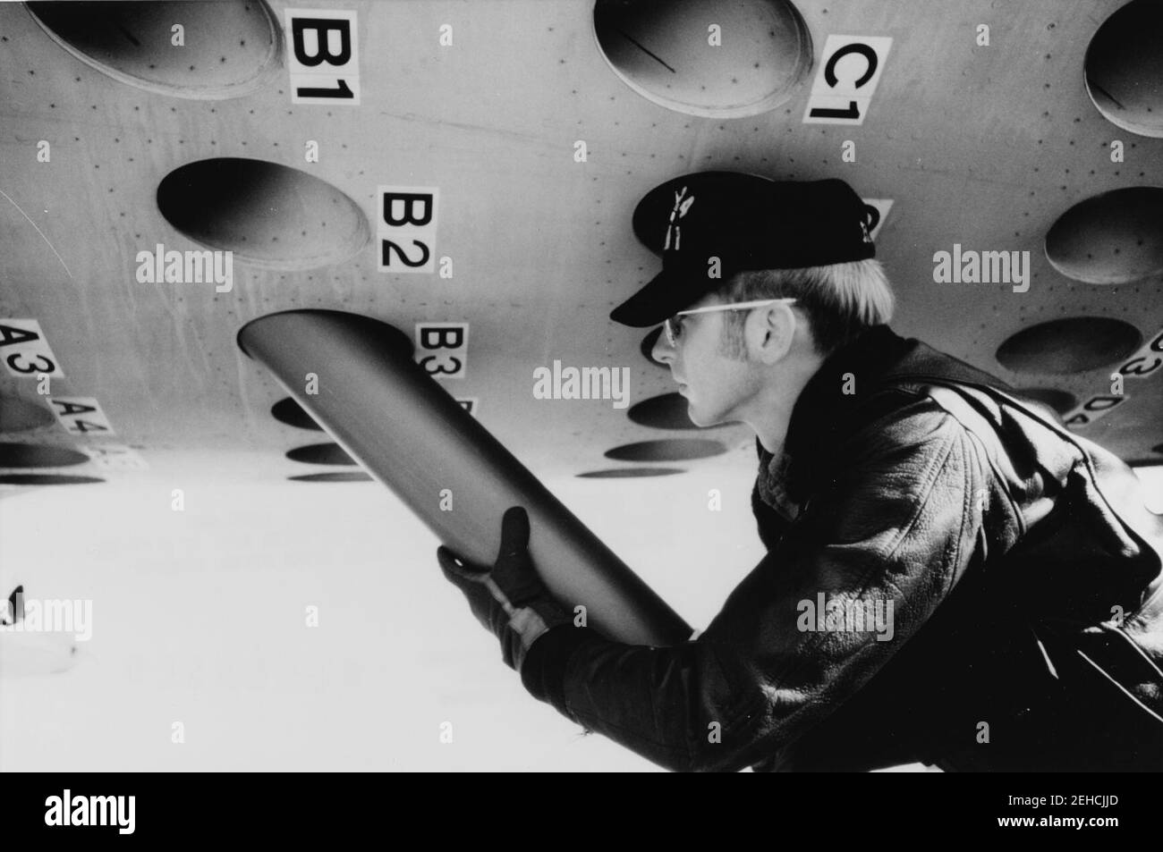 P-3C Orion of VP-24 is loaded with sonobuoys in 1971 Stock Photo - Alamy