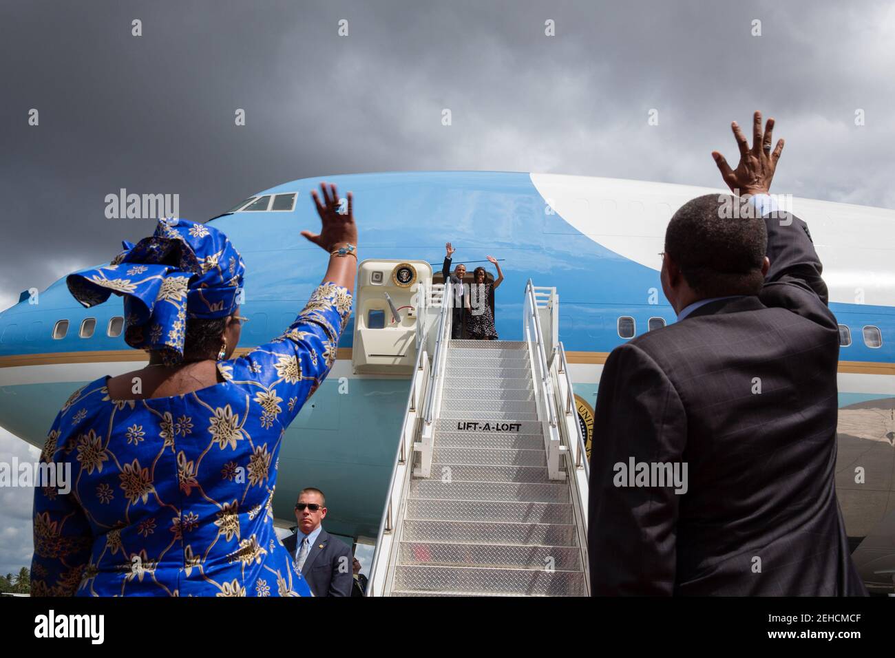 President Barack Obama And First Lady Michelle Obama Wave To President