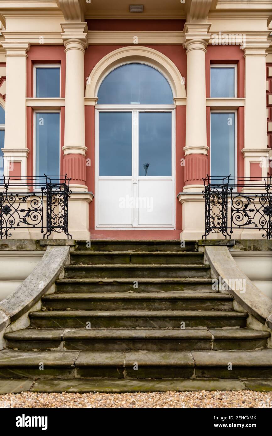Facade of renovated tenement house with old stairs Stock Photo - Alamy