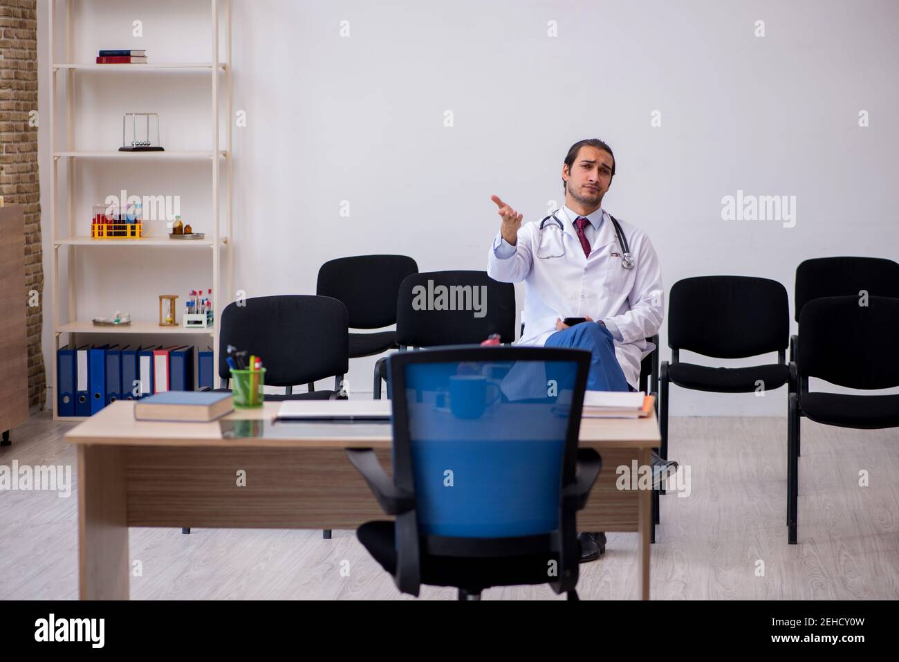 Young doctor giving seminar in the classroom Stock Photo - Alamy