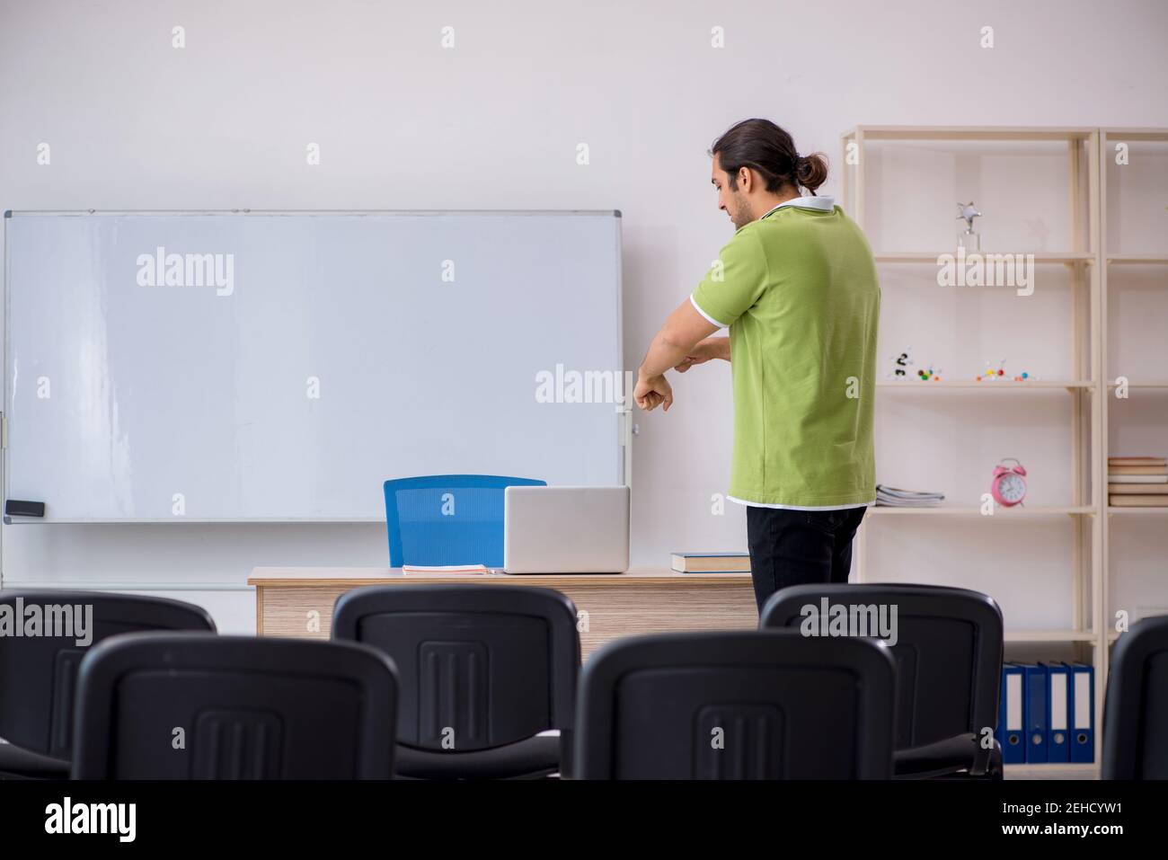 Young student in business presentation concept Stock Photo - Alamy