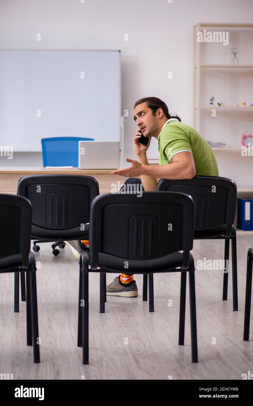 Young student in business presentation concept Stock Photo - Alamy