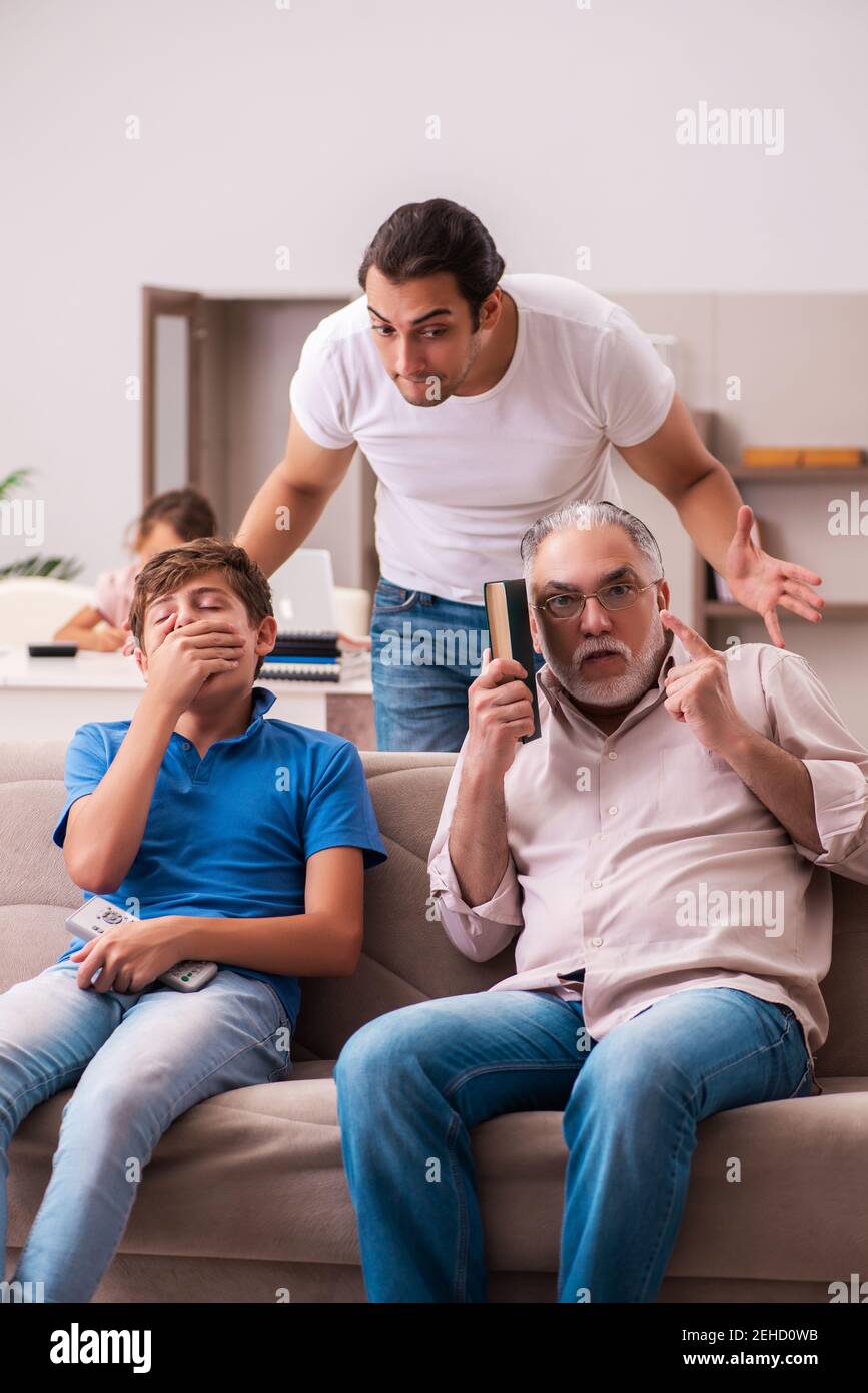 Three generations at home in early development concept Stock Photo - Alamy