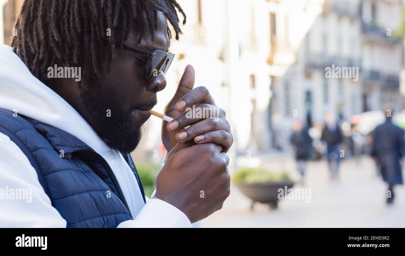 Lighting A Cigarette Side View