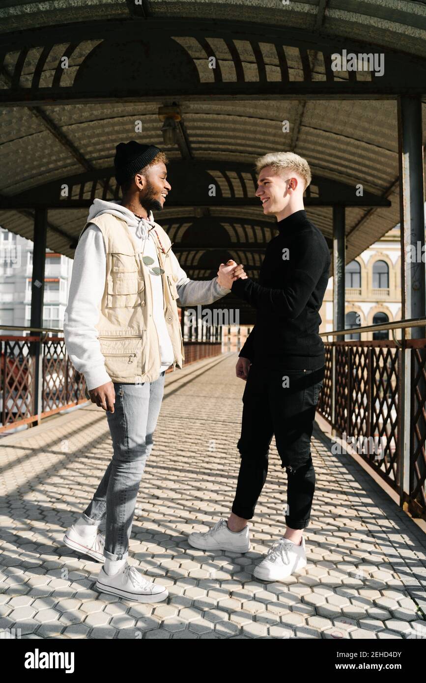 Best friends shaking hands hi-res stock photography and images - Alamy