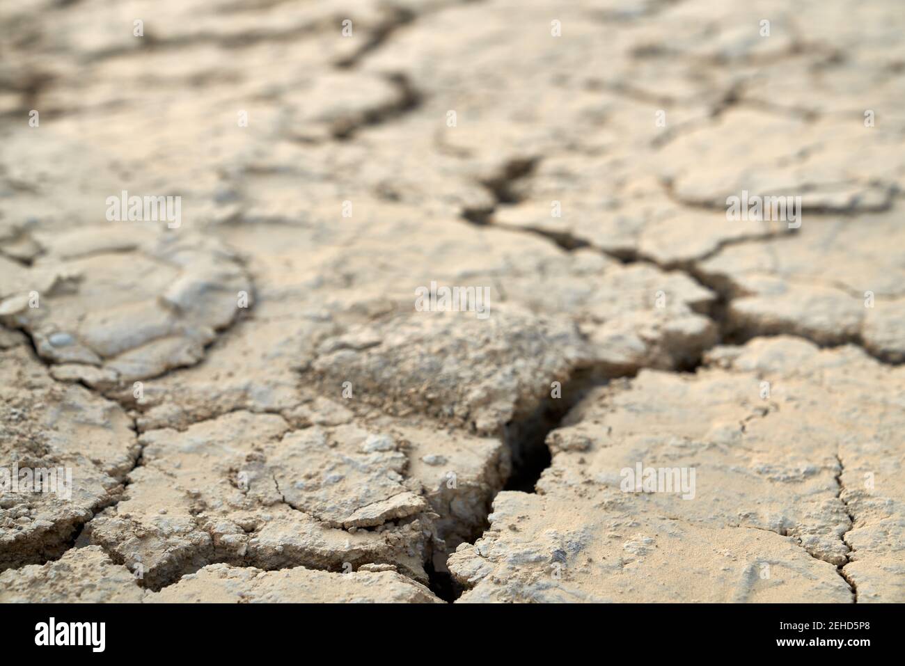 Top view of cracks ground in desert, texture beige stones. Concept of ...