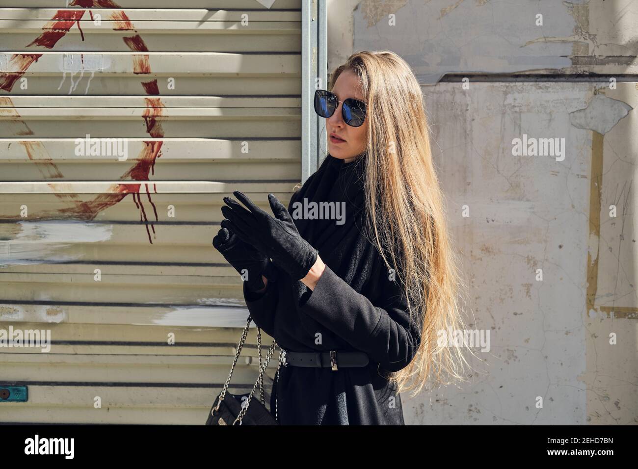 Cheerful female counselor listening to anonymous client while helping ...